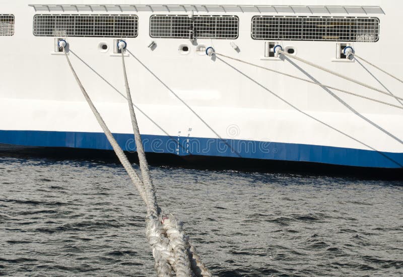 Ship ropes and moored ship stock image. Image of marine - 27411743