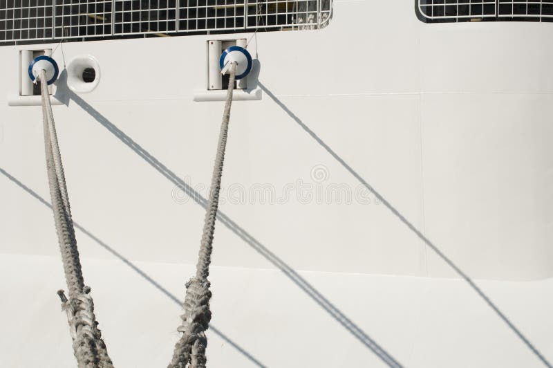 Ship ropes and moored ship stock image. Image of iron - 27411747