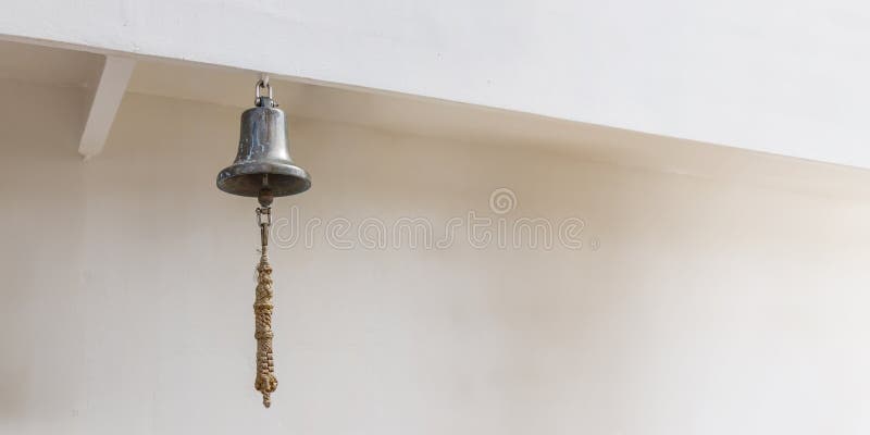 Ship S Bell on a White Wall Against a Blue Sky on a Sailing Ship Stock ...