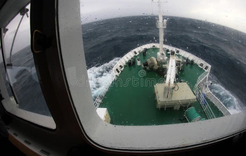 Ship`s Bow Diving into a Big Splashing Wave, Antarctica Stock Photo ...