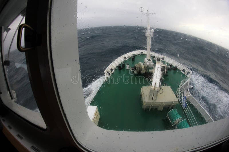 Ship`s Bow Diving into a Big Splashing Wave, Antarctica Stock Photo ...