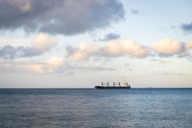 Ship in the Sea on the Horizon Stock Image - Image of horizon, shipping ...
