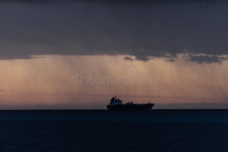 A Ship is Seen Cruising Under a Storm Stock Photo - Image of freight ...
