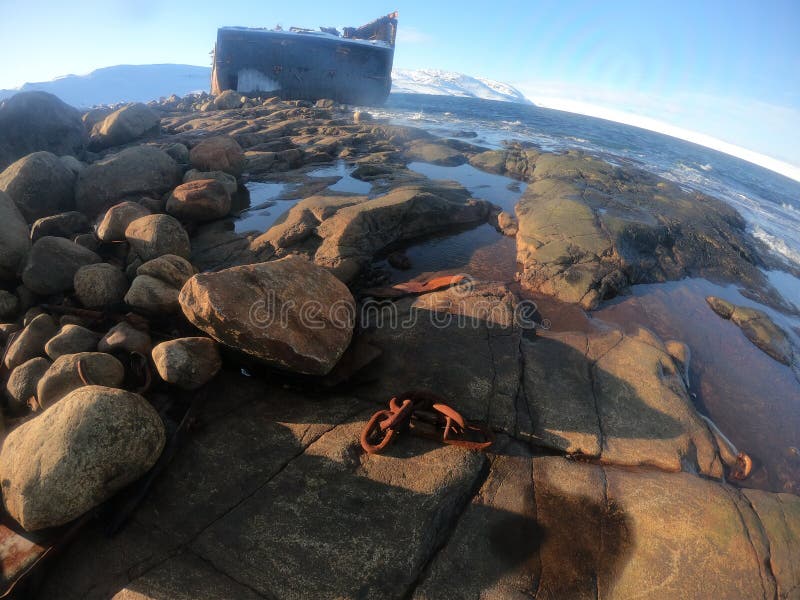 Ship on shore rocks stock image. Image of thrown, baller - 177516643