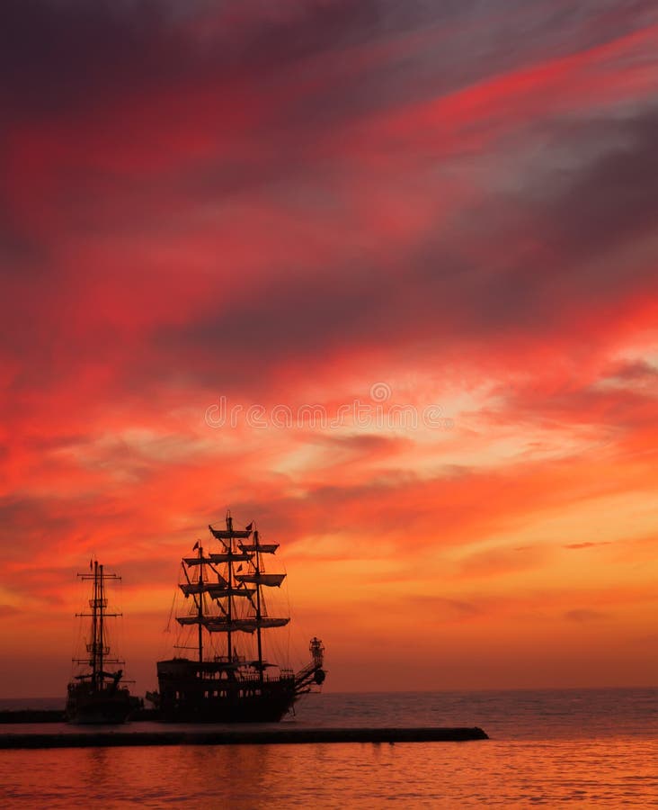 Ship silhouette at sunset stock photo. Image of sunlight - 32335634