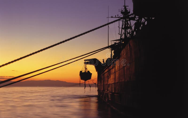 Ship at sunset stock photo. Image of nautical, isolated - 188124074