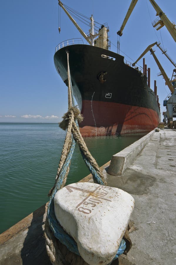 Ship under loading stock photo. Image of export, carrier - 86616840