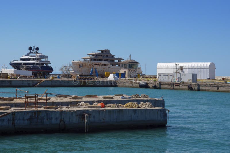 Ship Under Maintenance at a Outdoor Shipyard Stock Image - Image of ...