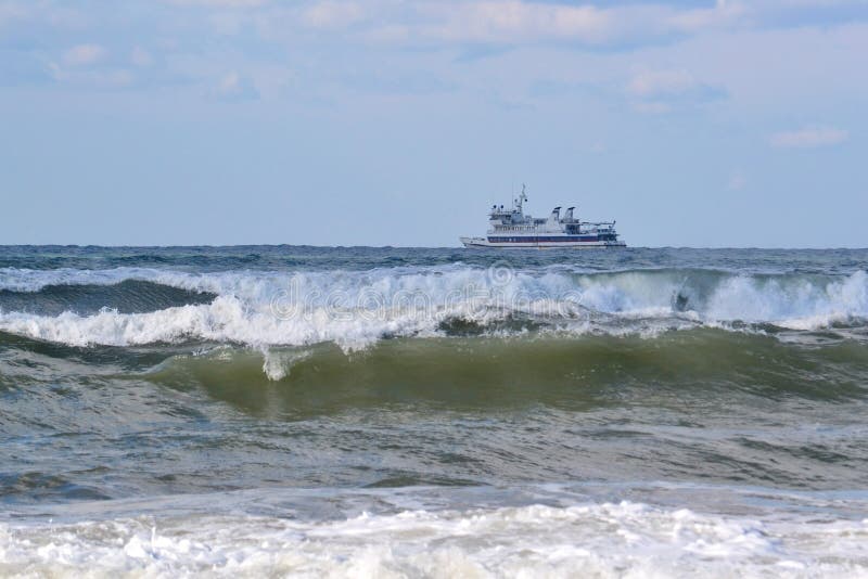 The Ship on Waves in the Sea. Stock Photo - Image of weather, ocean ...