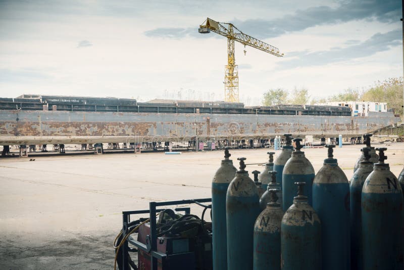 Ship yard with rusty ship stock photo. Image of rusty - 165387578