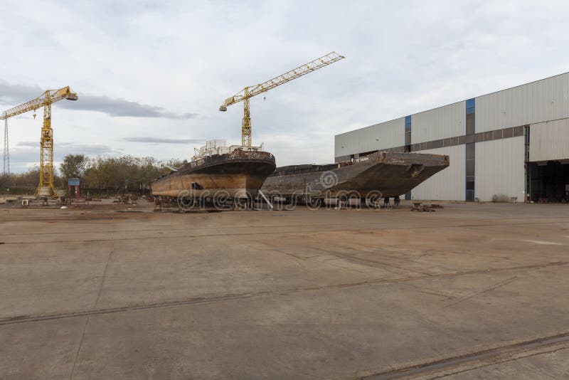 Ship yard with rusty ship stock image. Image of industry - 165387729
