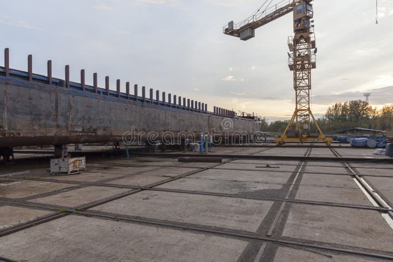 Ship yard with rusty ship editorial photography. Image of repair ...