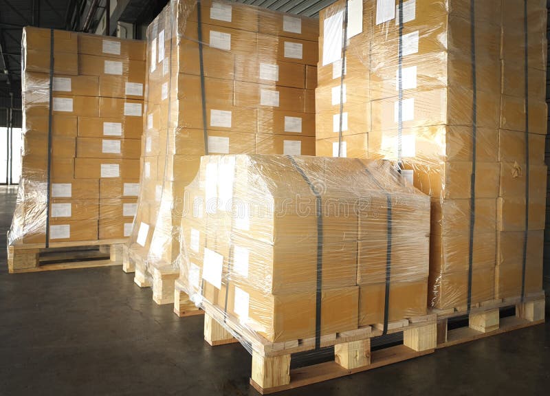 Shipment Boxes. Cargo Export. Stacked of Cardboard Boxes on Pallet Rack ...
