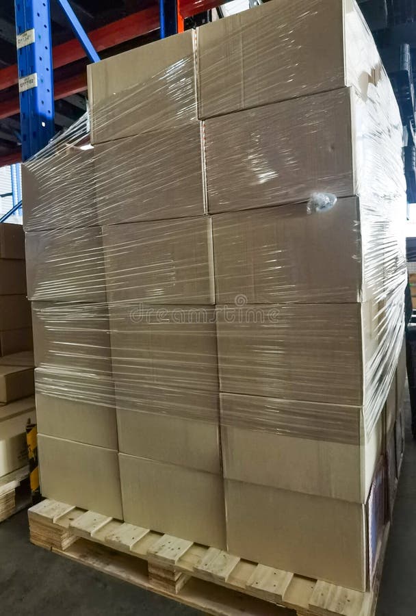 Shipment Cartons Box on Pallets and Wooden Case on Forklift in Interior ...