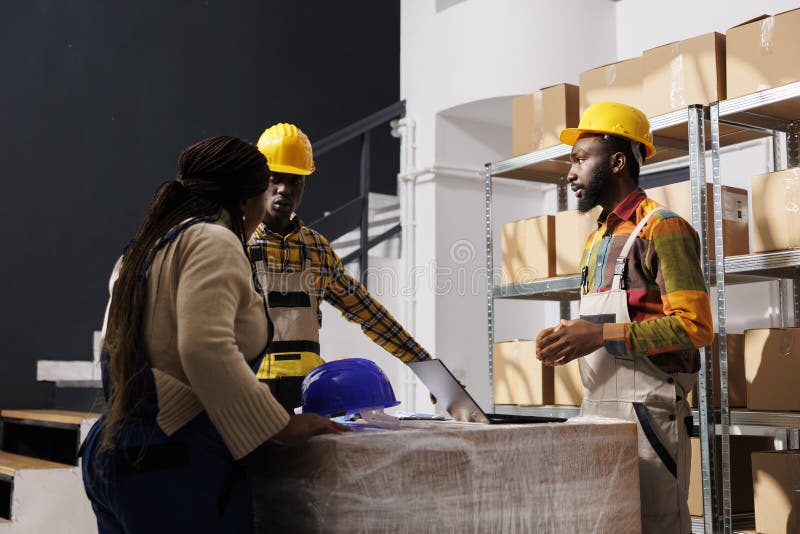 Shipment Managers Explaining Supervisor Inventory System in Storehouse ...