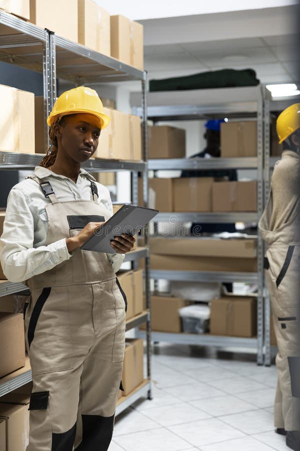 Shipment Operations in Industrial Warehouse Involve Checking Dispatch ...