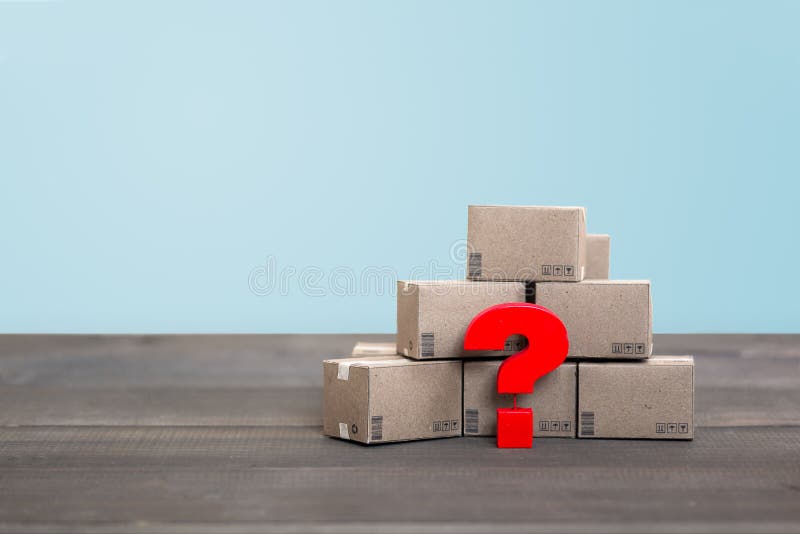 Shipping Box with Question Mark on Wood Table , Problem Concept Stock ...