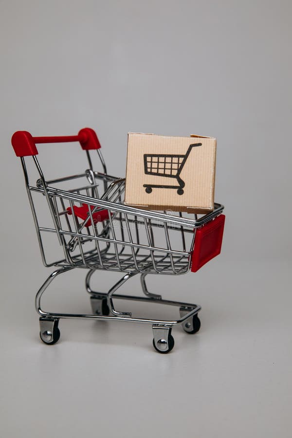 Shipping Boxes in Shopping Cart Trolley Close-up, Shopping and Commerce ...