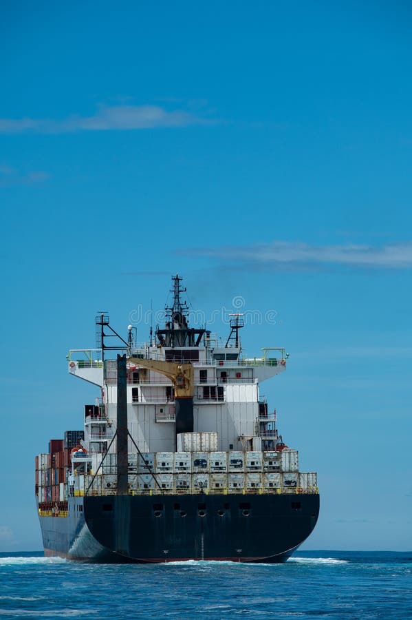 Shipping Container on a Blue Ocean with Blue Skies Stock Photo - Image ...