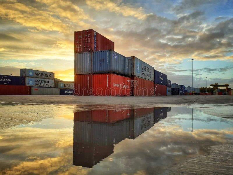 Shipping Container Boxes on a Port at Sunset Editorial Photo - Image of ...