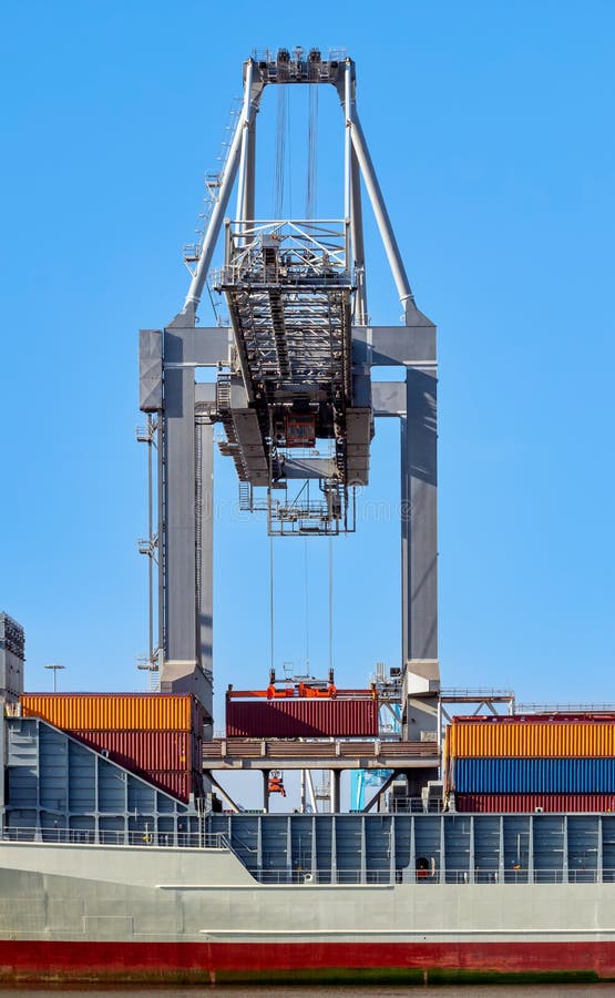Shipping Container Unloaded by Gantry Crane from a Industrial Ship in ...
