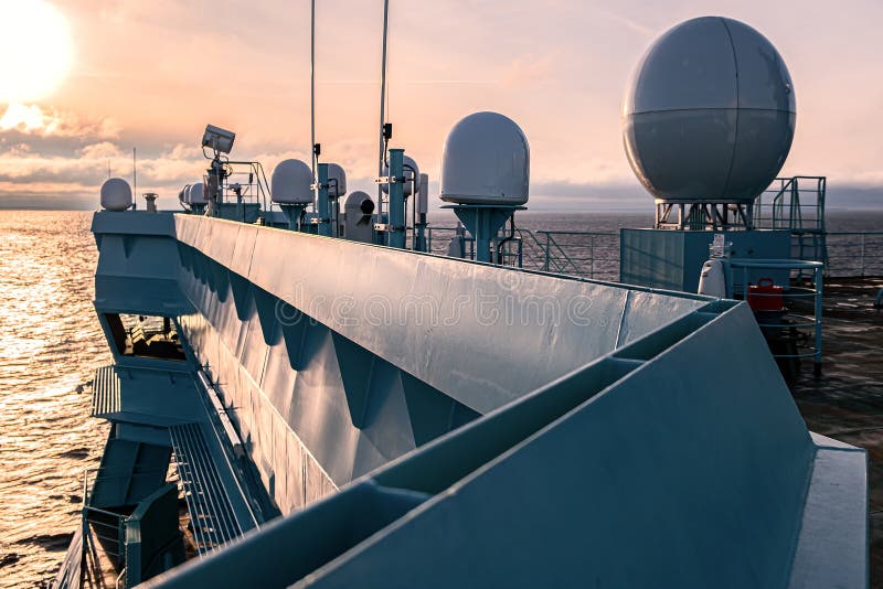 Ships Antenna and Navigation System in a Clear Blue Sky. Stock Image ...
