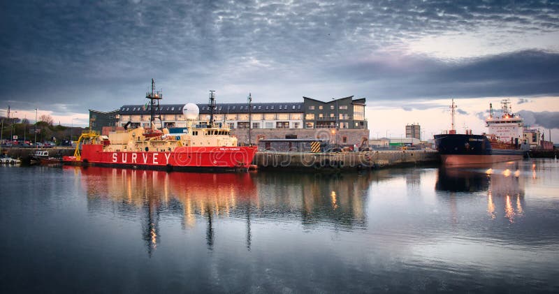 Ships at Galway Docks Under Dark Dramatic Skies Stock Image - Image of ...