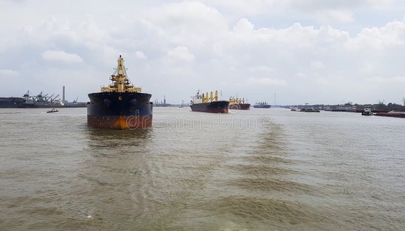 Ships in Line Anchored at River Stock Image - Image of nautical, crisis ...
