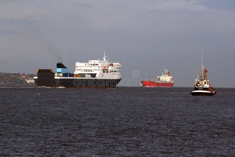 Ships at mouth of port stock photo. Image of sailing, water - 1646510