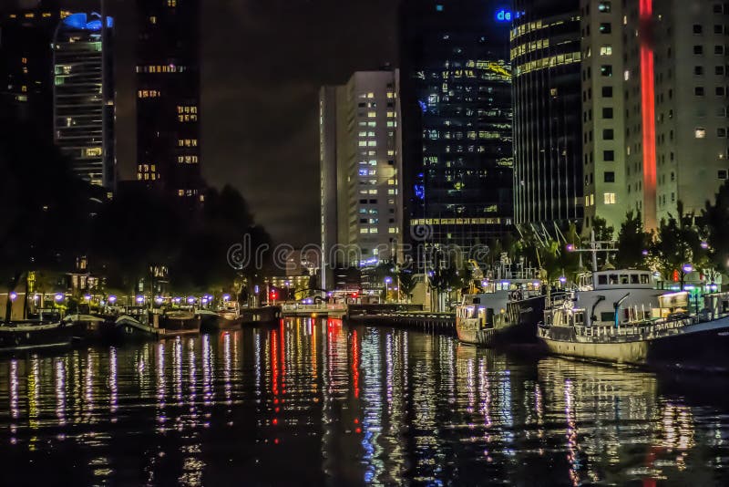 Ships on the River in Rotterdam at Night with the Reflection of ...