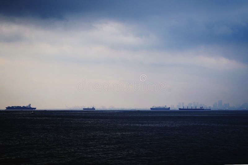 Ships viewed from afar stock photo. Image of beautiful - 108904752