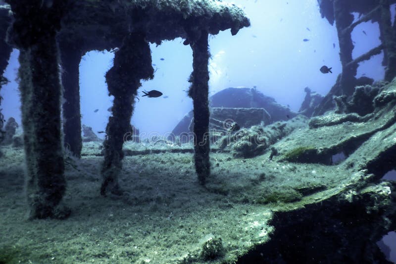 Shipwreck in the Blue Water, Rusty Shipwreck with Growing Corals Stock ...