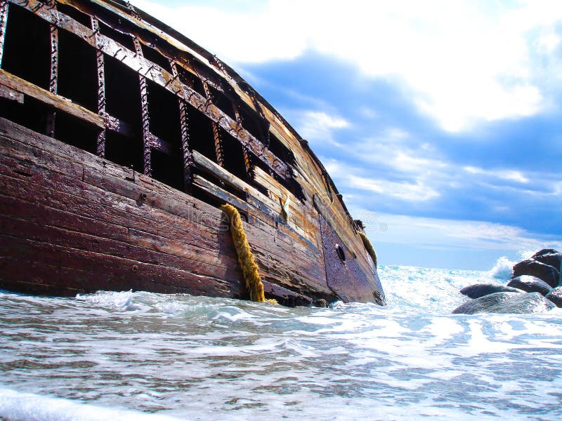 Shipwreck of a Sailing Ship after a Storm with Blue Sky. Stock Image ...