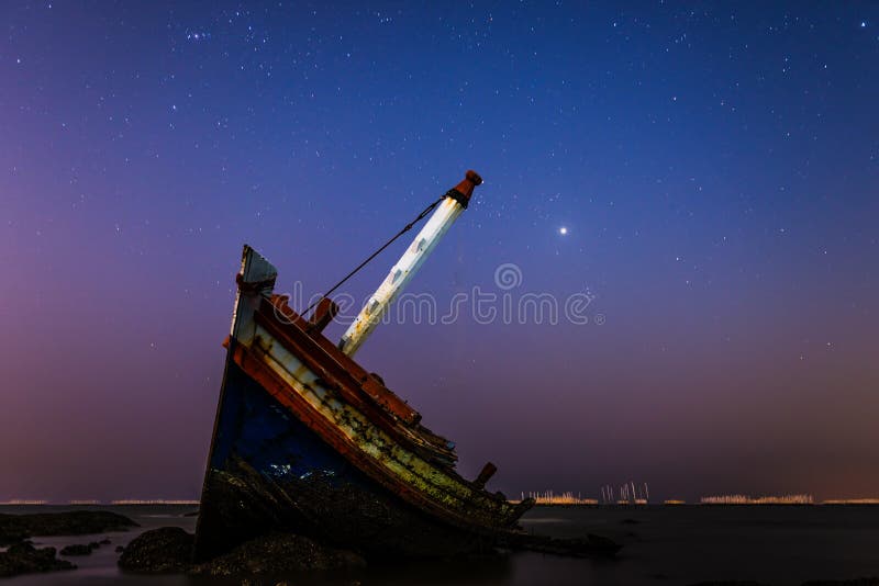 Shipwreck or wrecked boat stock photo. Image of coastline - 228769494