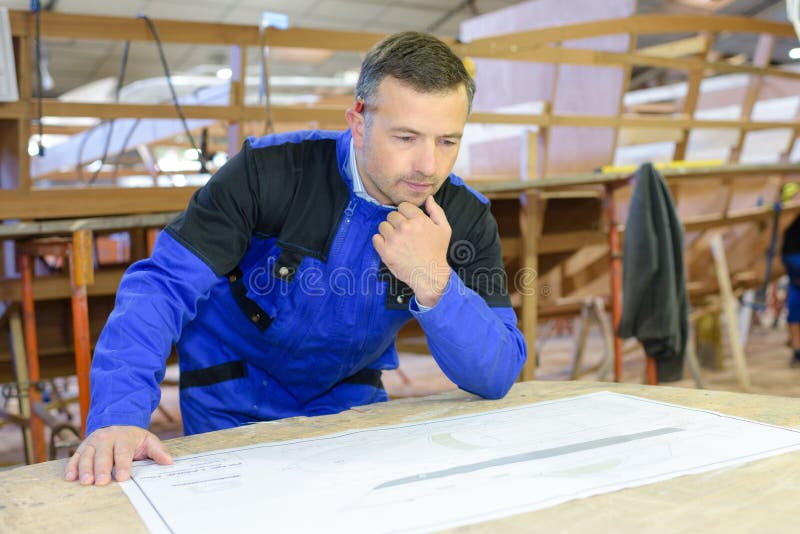 Shipwright studying design stock image. Image of order - 270840883