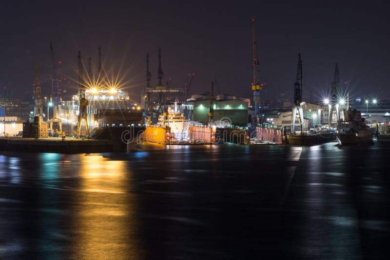 Shipyard Dockyard with Container Ships in Harbor of Hamburg at Night ...