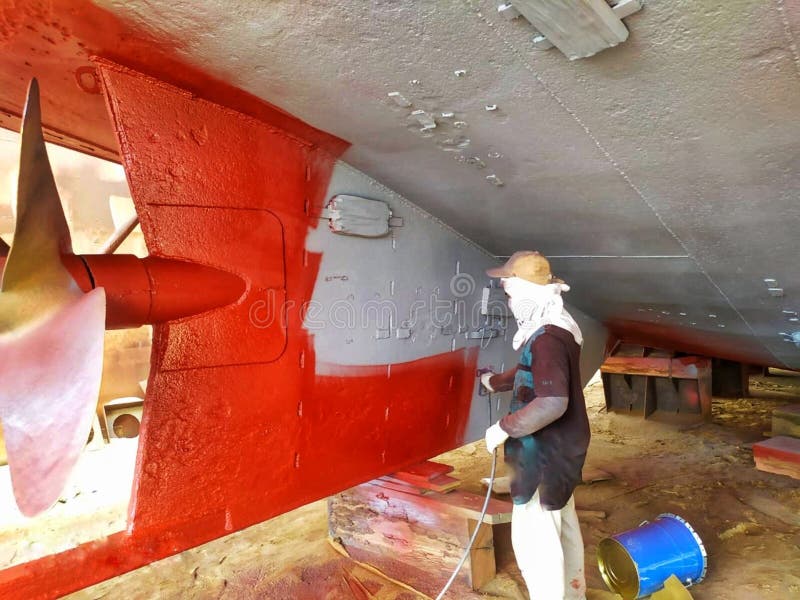 Shipyard Workers Carry Out the Process of Painting the Ship& X27;s Hull ...