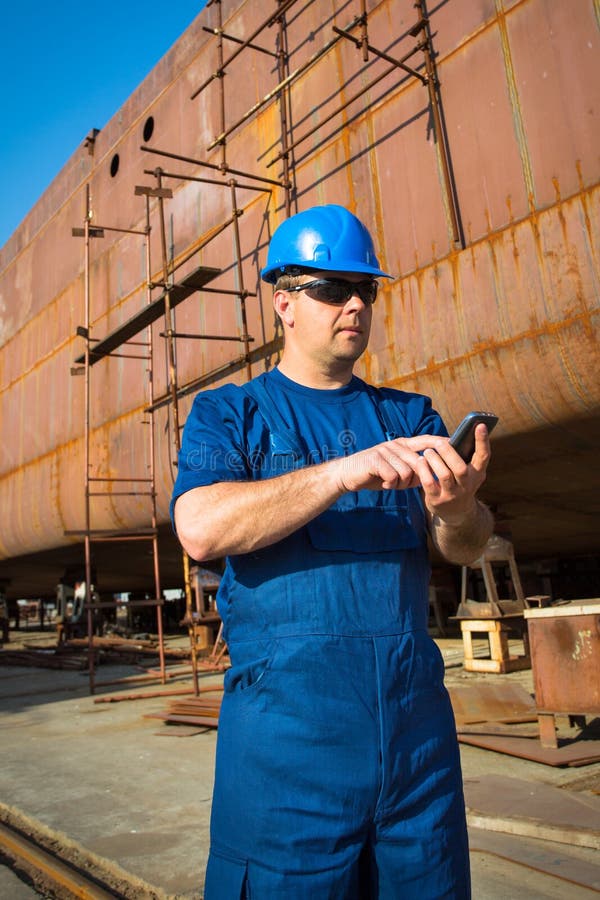 Shipyard workers stock image. Image of jacket, factory - 30762385