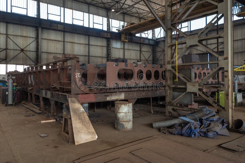 Shipyard Workers are Working in the Hangar To Build a New Ship Stock ...