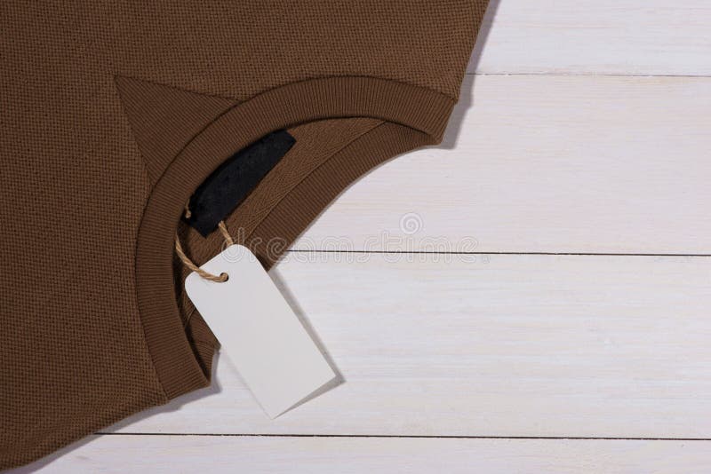 Shirt Price Tag. Rectangular Tag is Attached To a Sweater Stock Photo ...