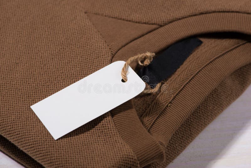 Shirt Price Tag. Rectangular Tag is Attached To a Sweater Stock Photo ...