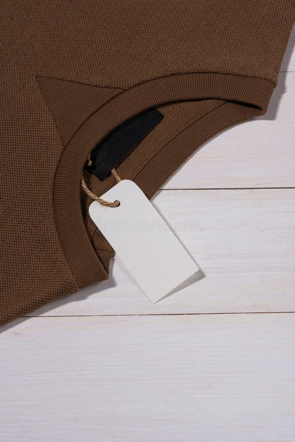 Shirt Price Tag. Rectangular Tag is Attached To a Sweater Stock Image ...