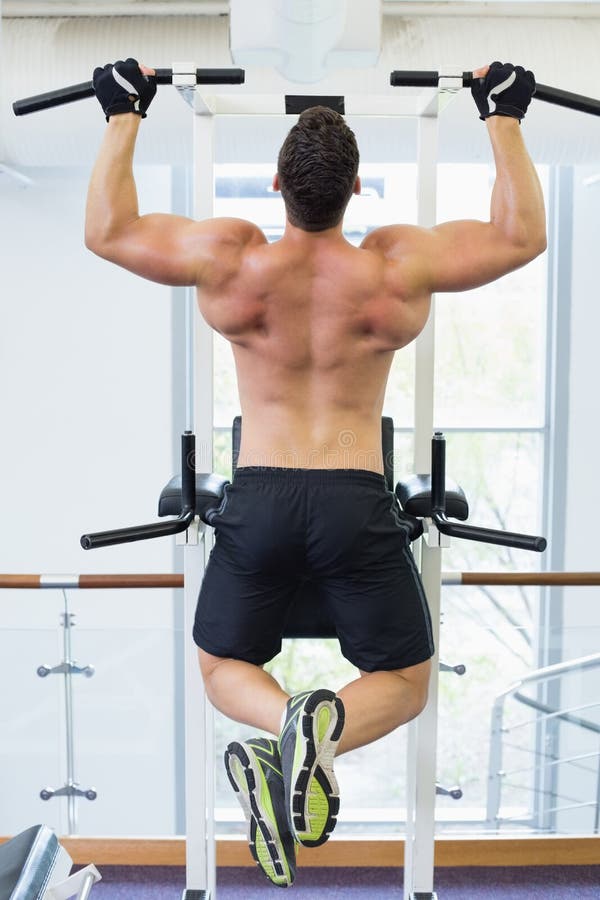 Shirtless Bodybuilder Doing Pull Ups Stock Image - Image of determined ...