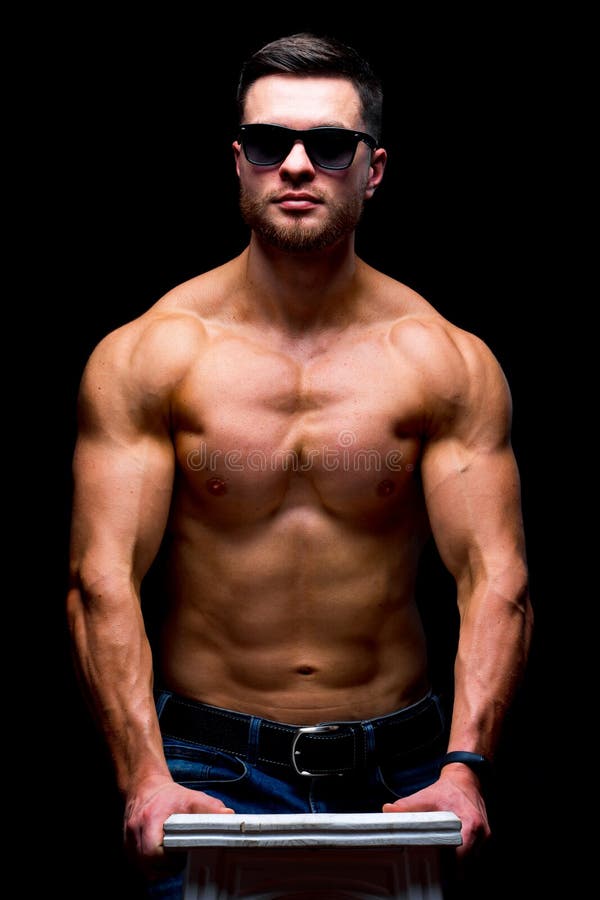 Shirtless Handsome Male With A Perfect Muscular Body Posing While