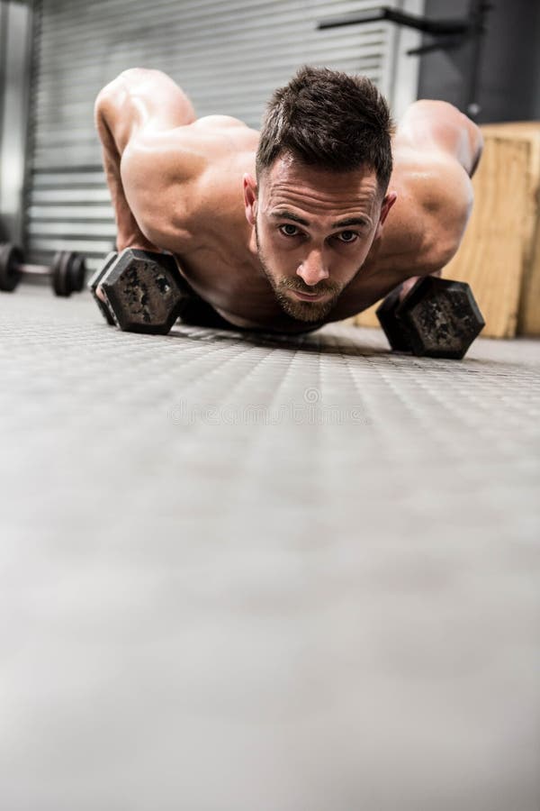 Shirtless Man Doing Push Up with Kettlebells Stock Image - Image of ...