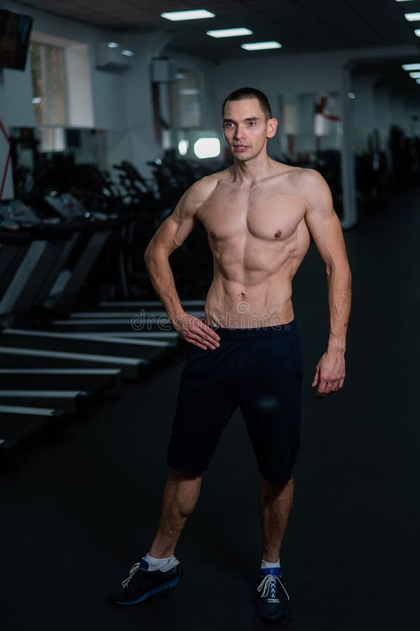 Shirtless Man with Sculpted Body in the Gym. Stock Photo - Image of ...