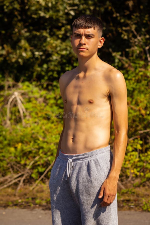 Shirtless on a summer day stock photo. Image of teenager - 230053324