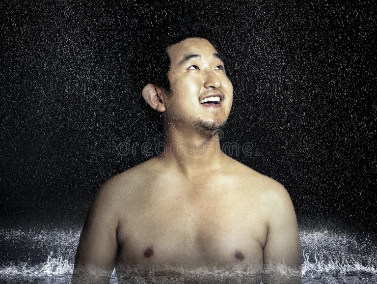 Shirtless Young Man Enjoying Rain Stock Photo - Image of bare, poland ...