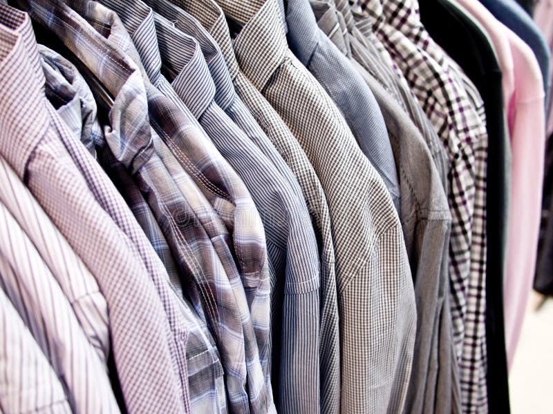Shirts in a menswear shop stock image. Image of white - 21896395