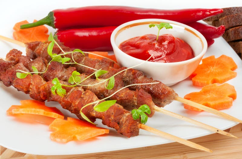 Shish Kebab with Herbs on a White Plate Stock Image - Image of lunch ...